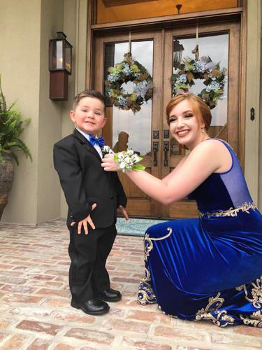 N.O. student's Marine Corps prom photos with boyfriend's baby brother ...