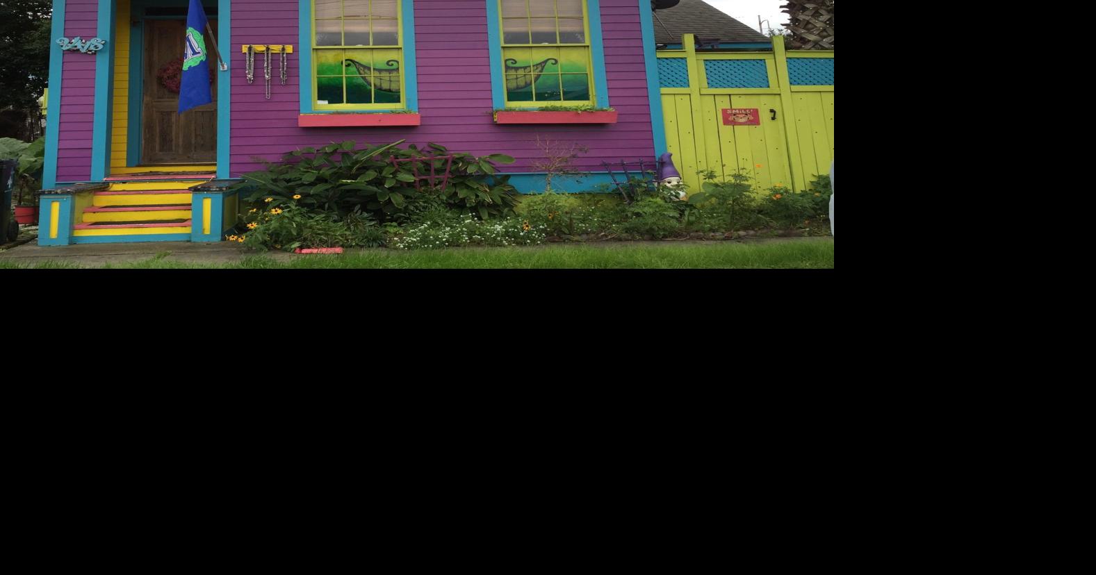 Purple, green and gold everywhere: City flies Mardi Gras colors year ...