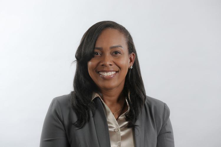 Elicia Broussard Sheridan: Mother, wife, and Saints, Pels VP | Saints ...