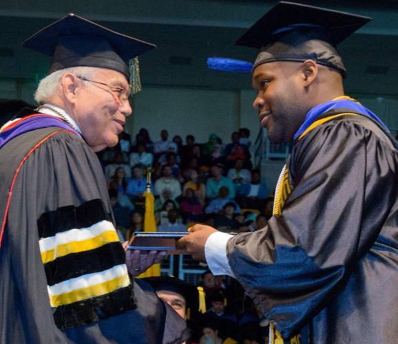Photos: Magic Johnson laughs with Xavier president Norman Francis ...