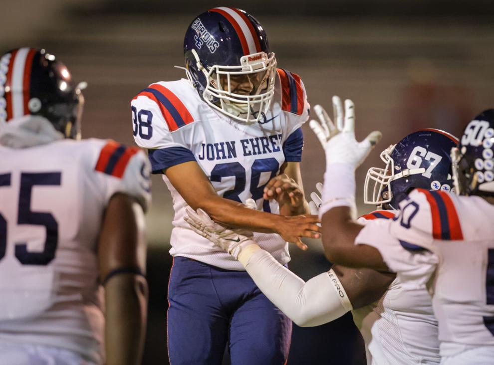 Photos: Archbishop Rummel takes on John Ehret in Friday night football ...