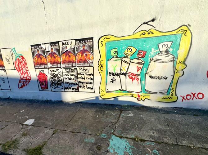 Artist arrested, accused of graffiti attack on Marigny wall ...