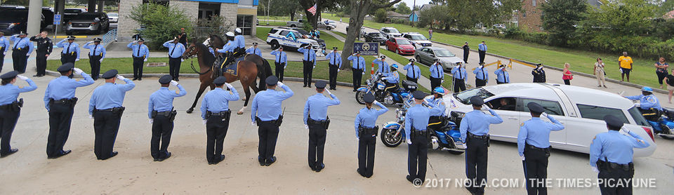 Slain police officer Marcus McNeil laid to rest in New Orleans: photo ...
