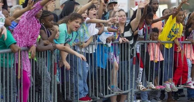 Zealous bead catchers know life on the parade route can be hazardous: A ...