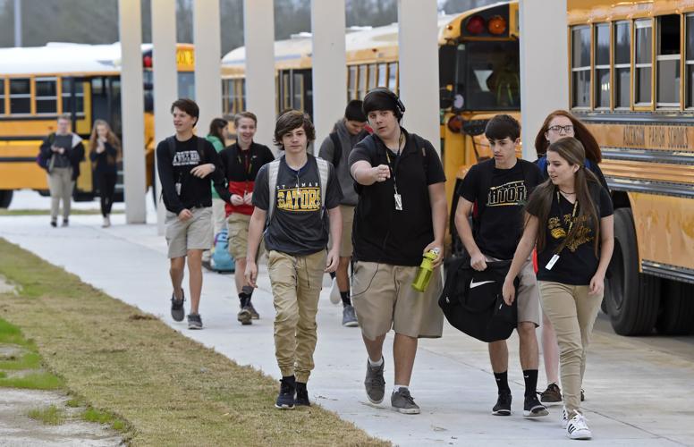 Video: Excited St. Amant students stream into school for first time ...