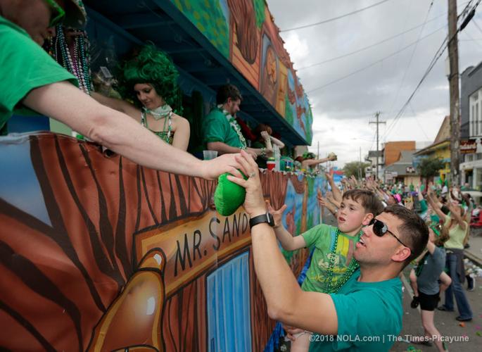 Irish Channel parade flows slowly down Magazine on St. Patrick's Day ...