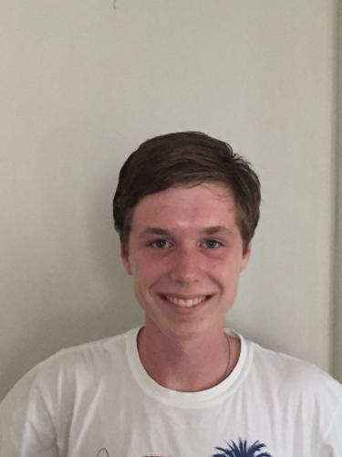 Cade Martin of Holy Cross, Henley Crosby of St. Scholastica named cross ...