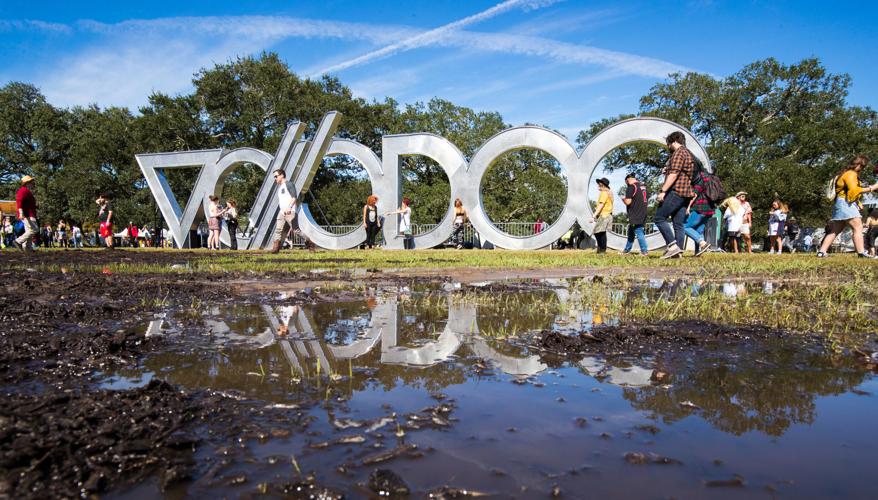 Mud and loud music mark the opening day of 2018 Voodoo Fest in City ...