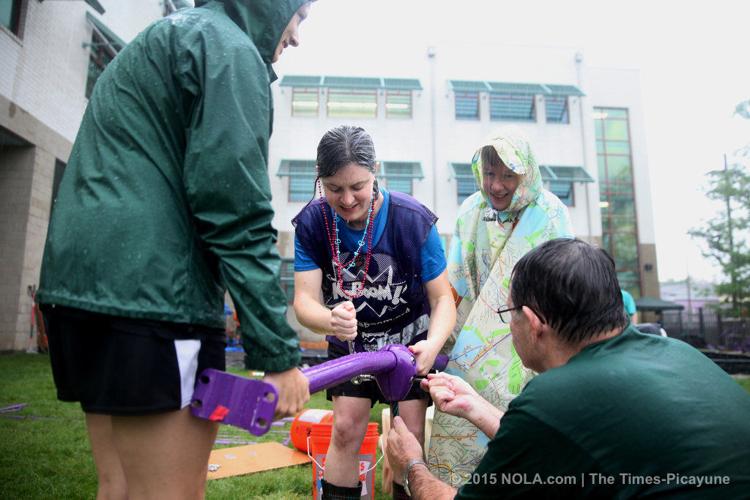Despite downpour, playground rises up for Morris Jeff Community School ...