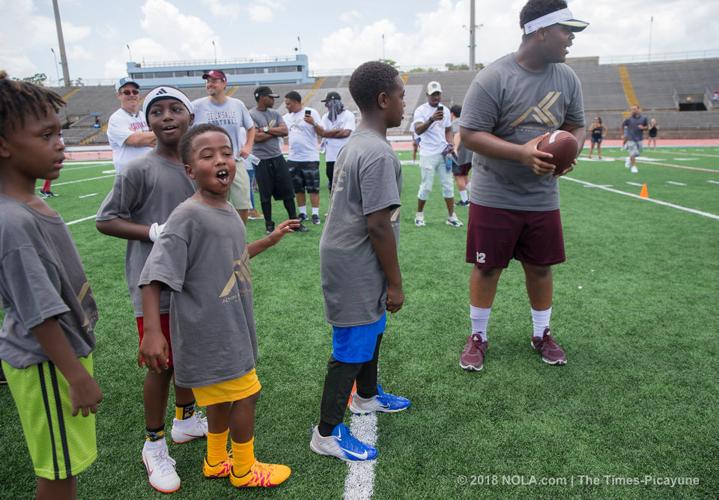 Alvin Kamara puts kids to work at first New Orleans football camp ...