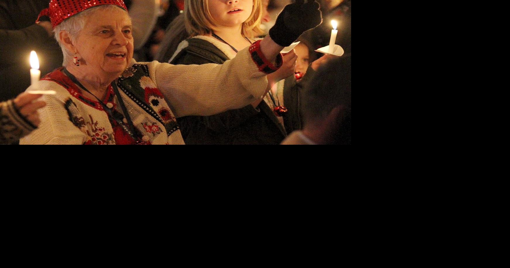 Carolers light the Covington night with candles and song | St. Tammany ...