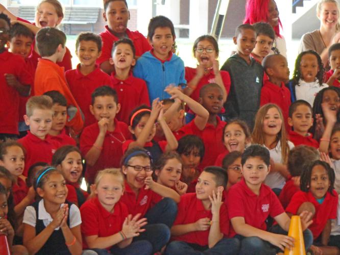 Bissonet Plaza students are rewarded for good behavior with dog show ...