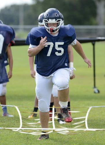 Lafayette Christian’s Josh Brister towers over most Class 1A players ...