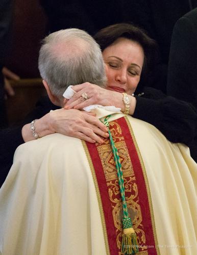 A solemn, reverent crowd awaited Tom Benson's funeral procession at ...