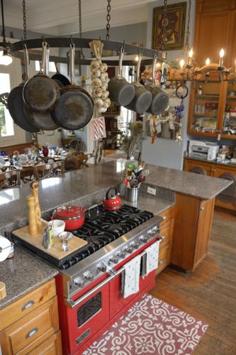 Kitchen is the heart of Garden District house where family and friends ...