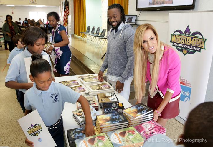WWE Superstars have story time at Harvey elementary school | Arts ...