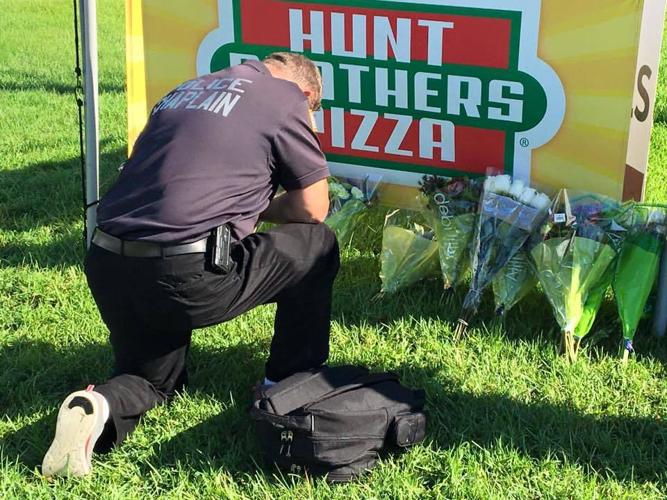 Photos: Community gathers to pray, share hugs, mourn fallen Baton Rouge ...