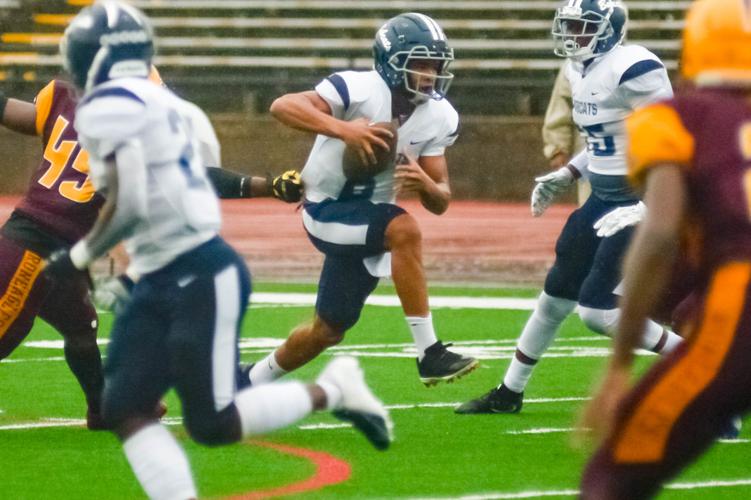 McDonogh 35 overcomes foul weather, Frederick Douglass to earn Wayne ...