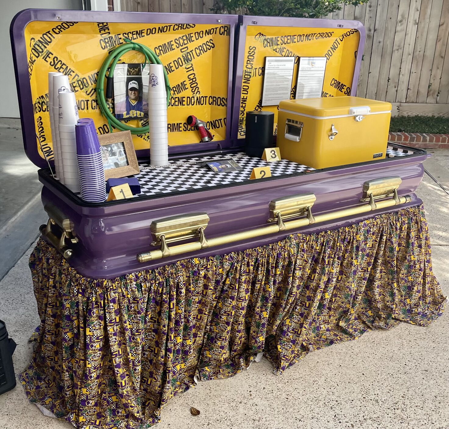 Purple casket owned by slain LSU superfan is transformed into a ...