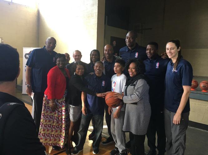 NBA Cares program provides refinished basketball court for BREC gym ...