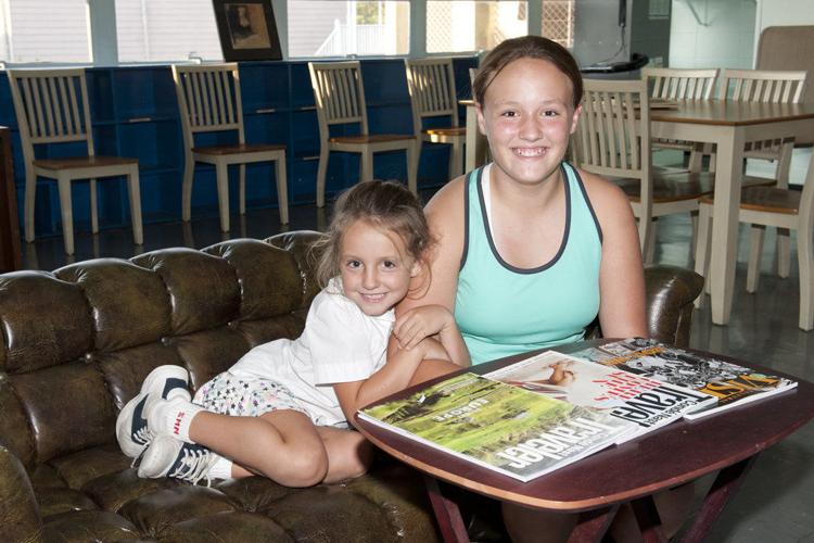 Checking out at the new library at the Bishop Perry Center | Parties ...