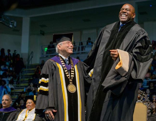 Photos: Magic Johnson laughs with Xavier president Norman Francis ...