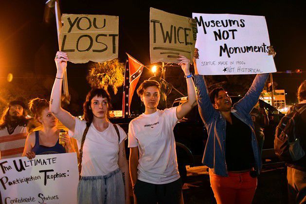 Scenes from the May 1 protest at the Jefferson Davis monument in New ...