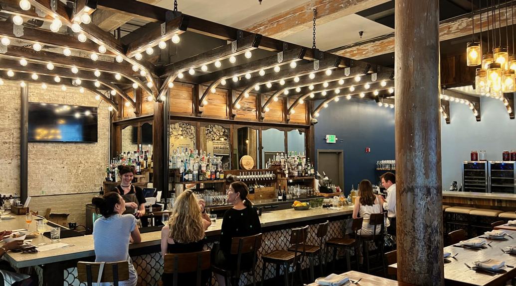 Small plates, long happy hour in the NOLA Warehouse District | Where ...