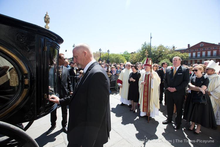 A solemn, reverent crowd awaited Tom Benson's funeral procession at ...