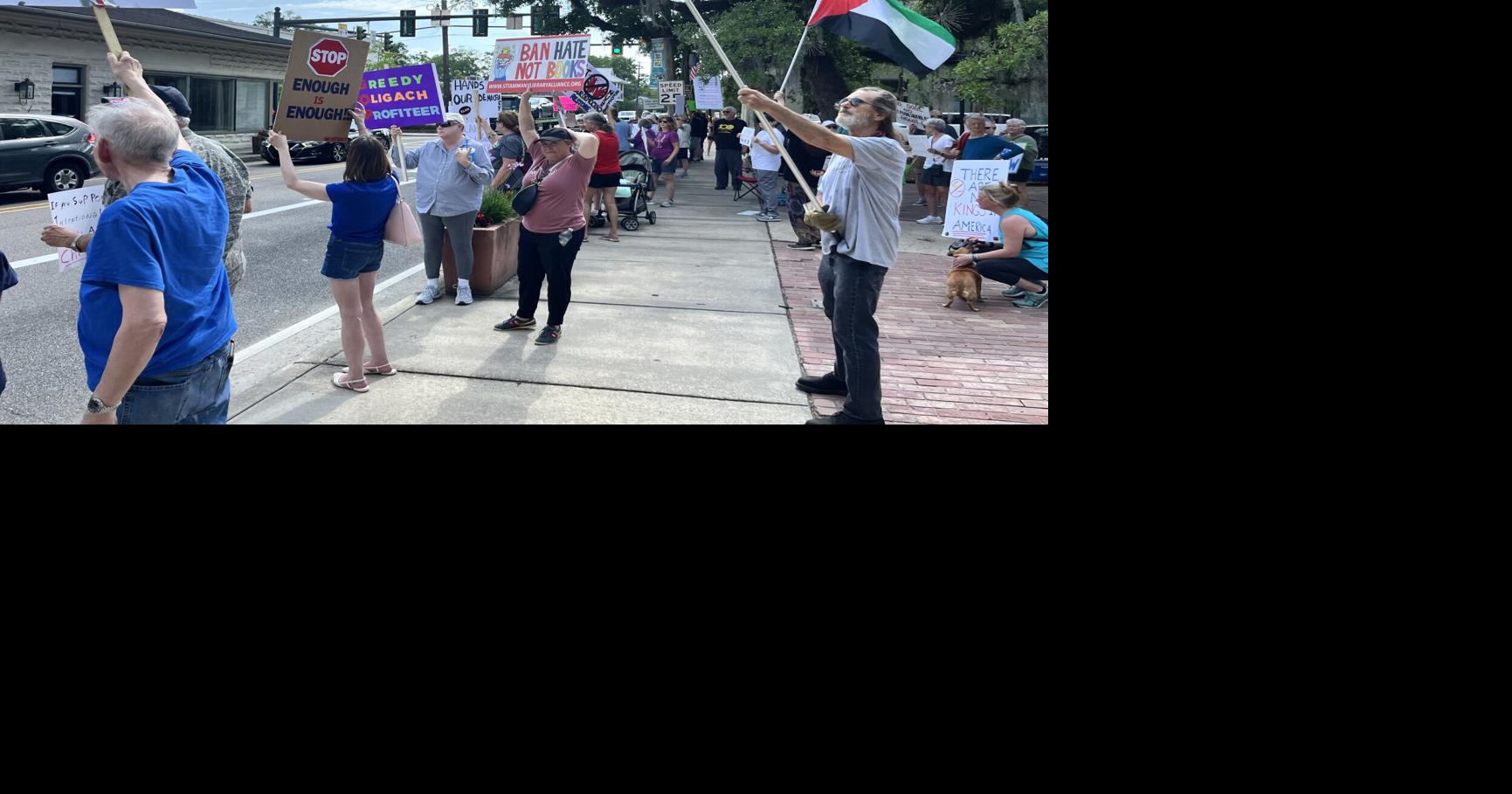 Northshore residents protest Trump policies in Covington | One Tammany ...
