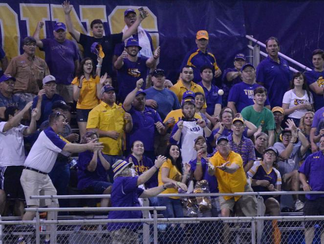 A face full of water? LSU's Zach Watson got his post-home run face bath ...