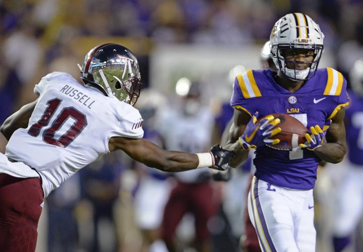Photos: Troy holds on for massive upset of LSU at Tiger Stadium ...