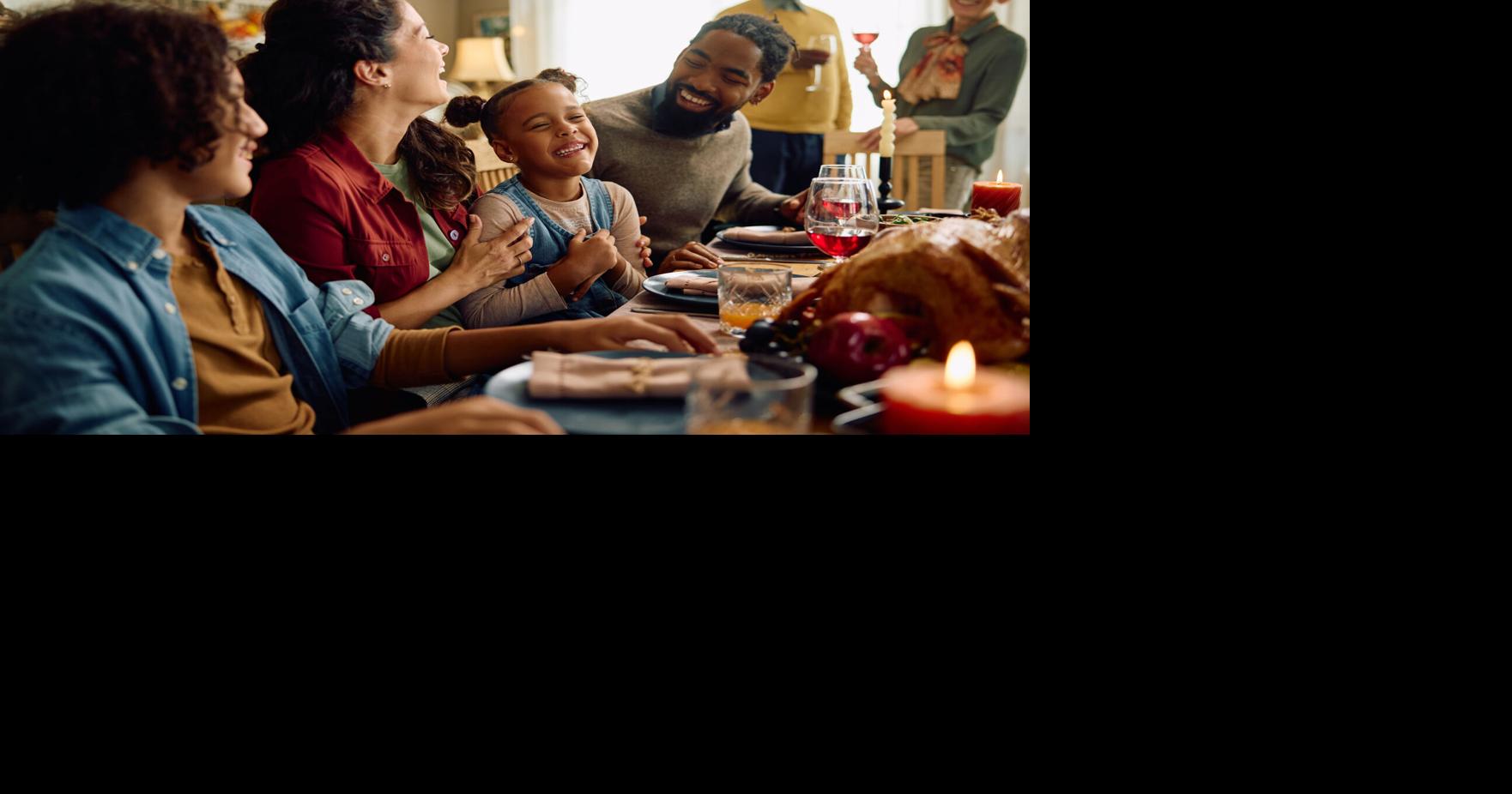 Happy multiracial extended family having fun and laughing while ...