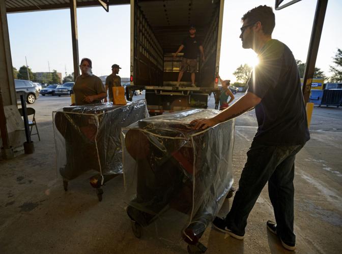 Photos: Election Day Eve, Polling Machines Leave Warehouse for Orleans ...