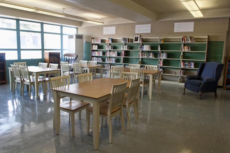 Checking out at the new library at the Bishop Perry Center | Parties ...