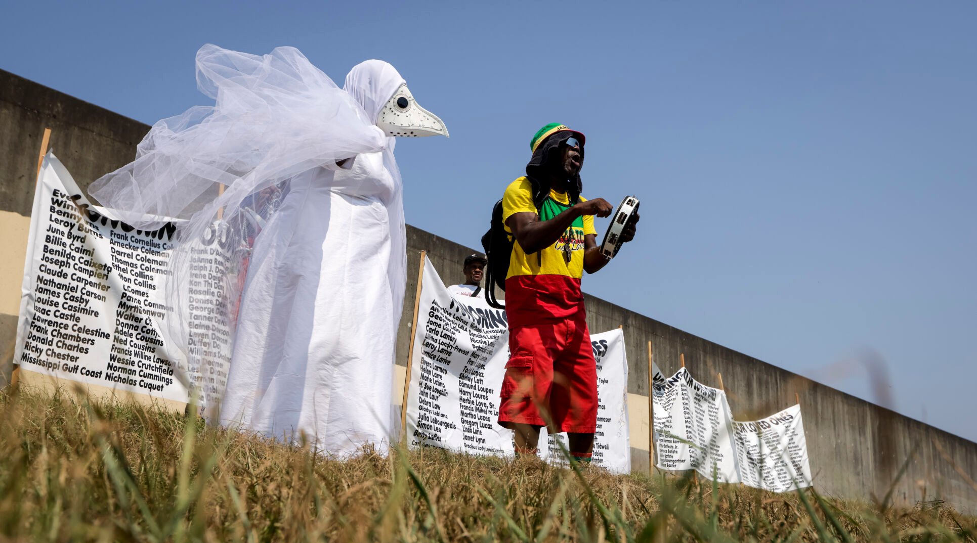 Photos: 18th anniversary of Hurricane Katrina commemorated near levee ...