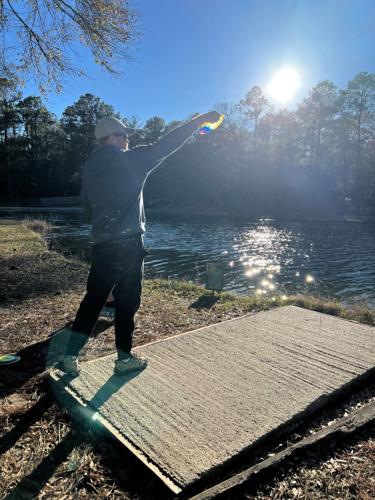 Jan Risher learns how to play disc golf from young teachers ...