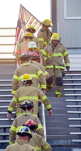 Area residents come together for 9/11 memorial stair climb | Select ...