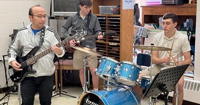 Teacher creates concert band to spread love of music | Select ...