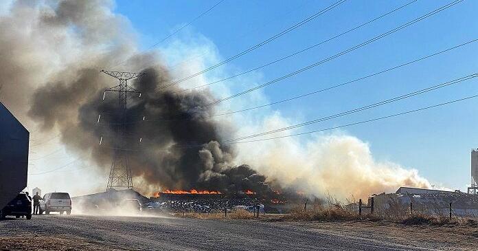 Crews continue to battle fire at feedlot Monday morning | News ...
