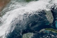 Tropical storm remnants drench Gulf states after tornadoes hit the ...
