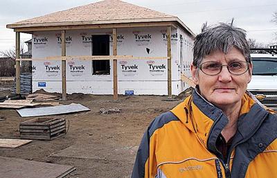 Volunteers meet with owner of house they’re building | News ...