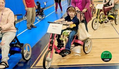 Children's charity gifts free adaptive bikes to local children with ...