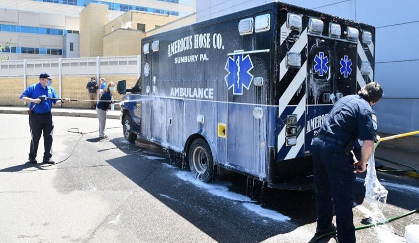 Volunteers wash ambulances for National EMS Week | News ...