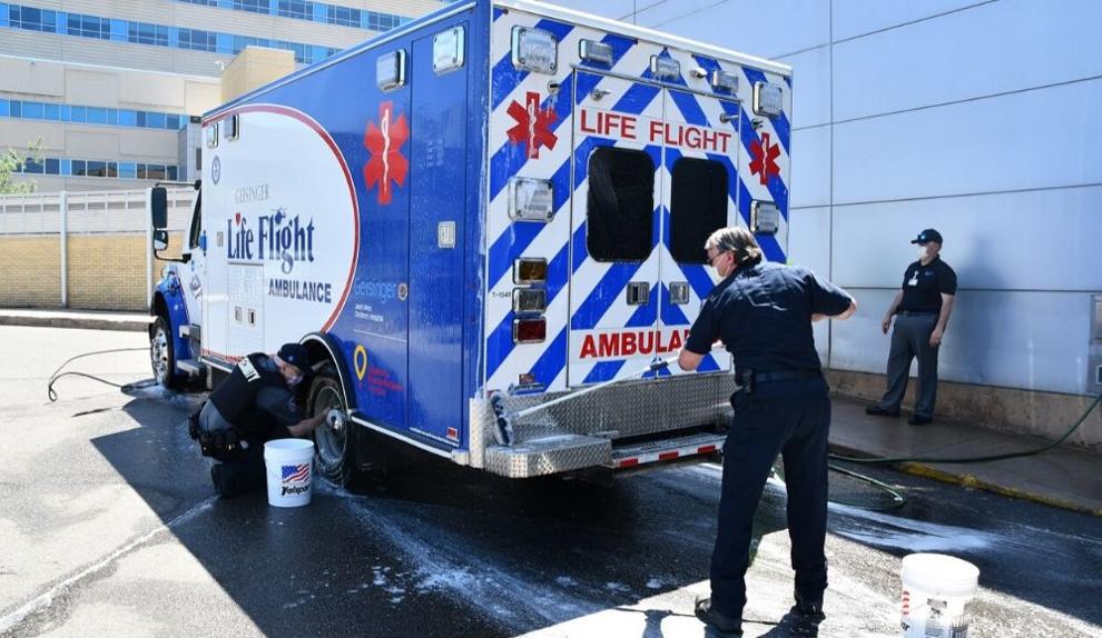 Volunteers wash ambulances for National EMS Week | News ...