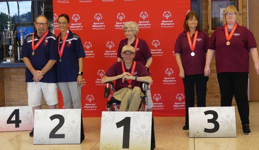 Special Olympics athletes go for gold at Chris 'Magic Hands' Boyce ...