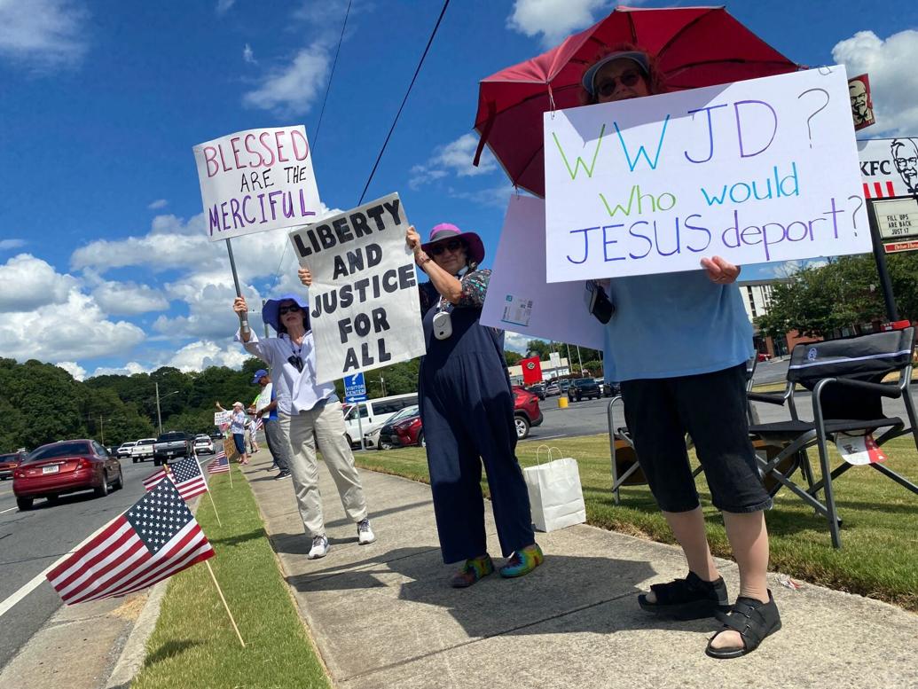 Indivisible protesters honor former Rep. John Lewis with Turner McCall ...