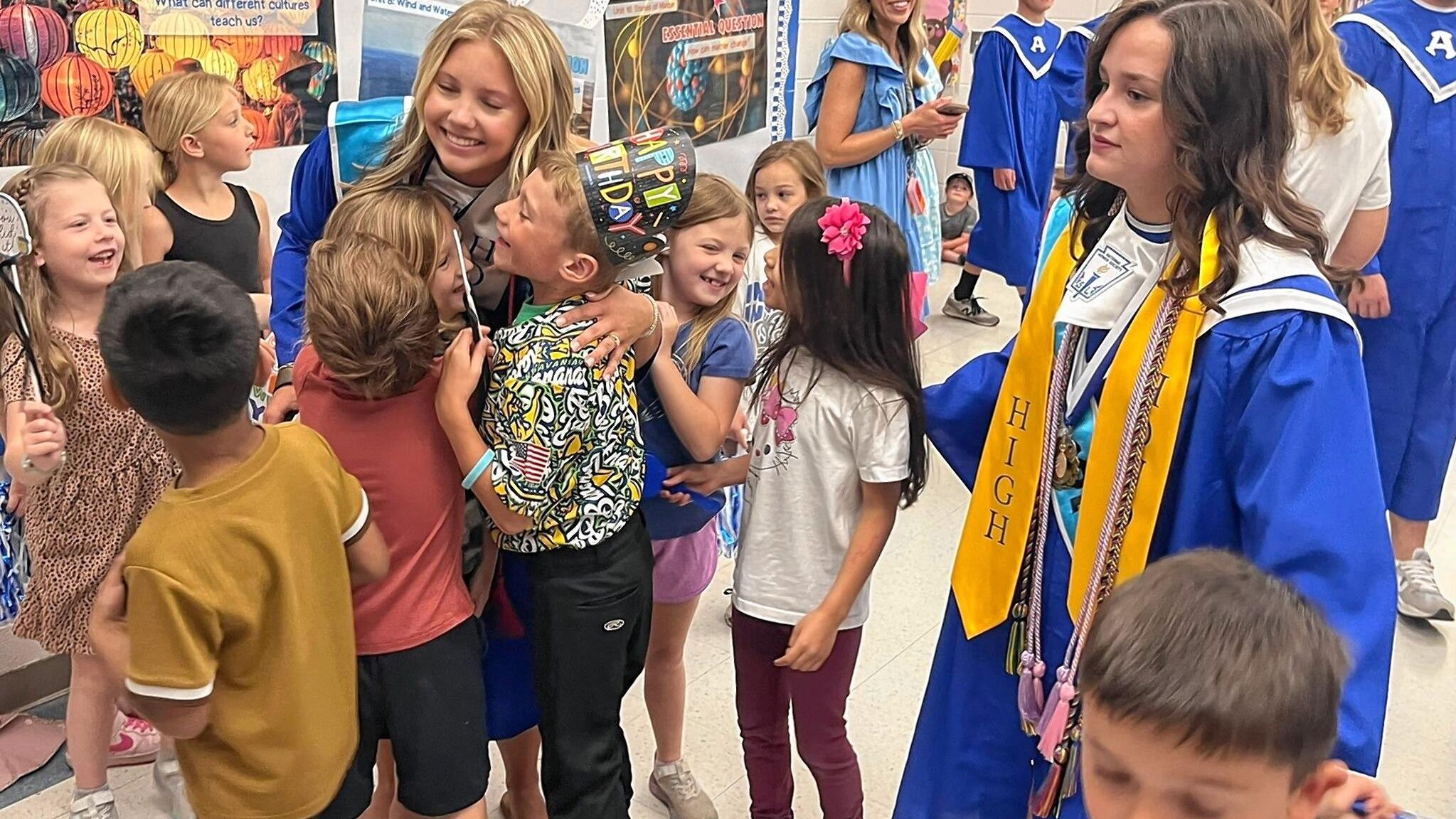 Floyd County seniors share full-circle moments during graduation walks ...