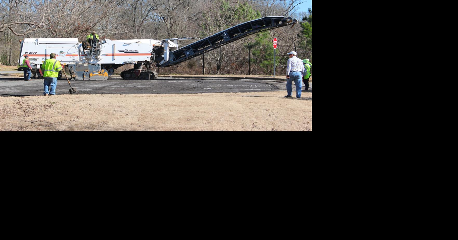Crews repave Coligni Way after Atlanta Gas Light pipeline work | Local ...