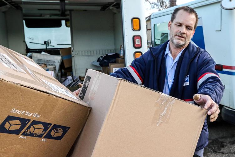 Calvin Palmquist, the beloved mailman and reluctant santa, remembered ...